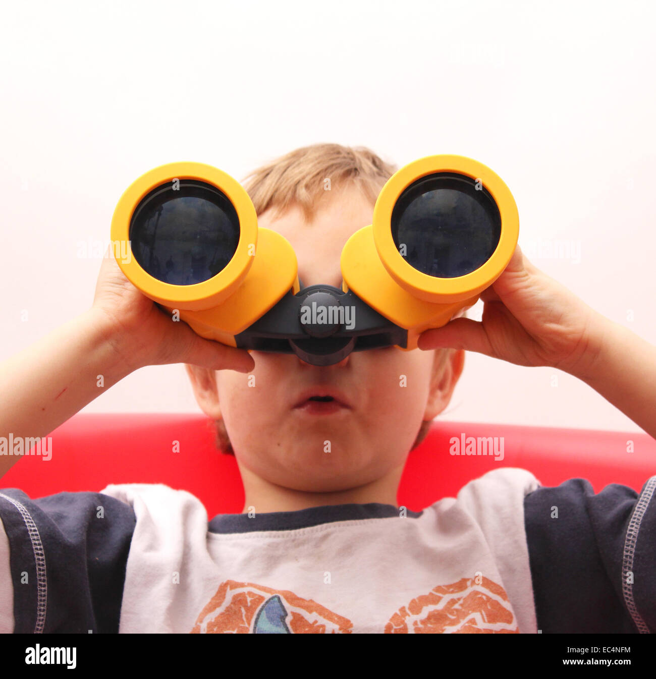 Child with binoculars Stock Photo - Alamy