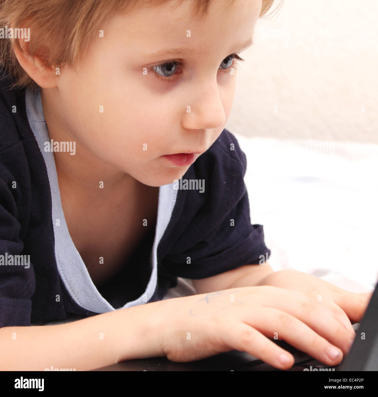 Child on the computer Stock Photo - Alamy