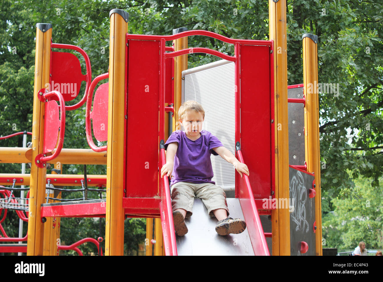 Small child on slide hi-res stock photography and images - Alamy