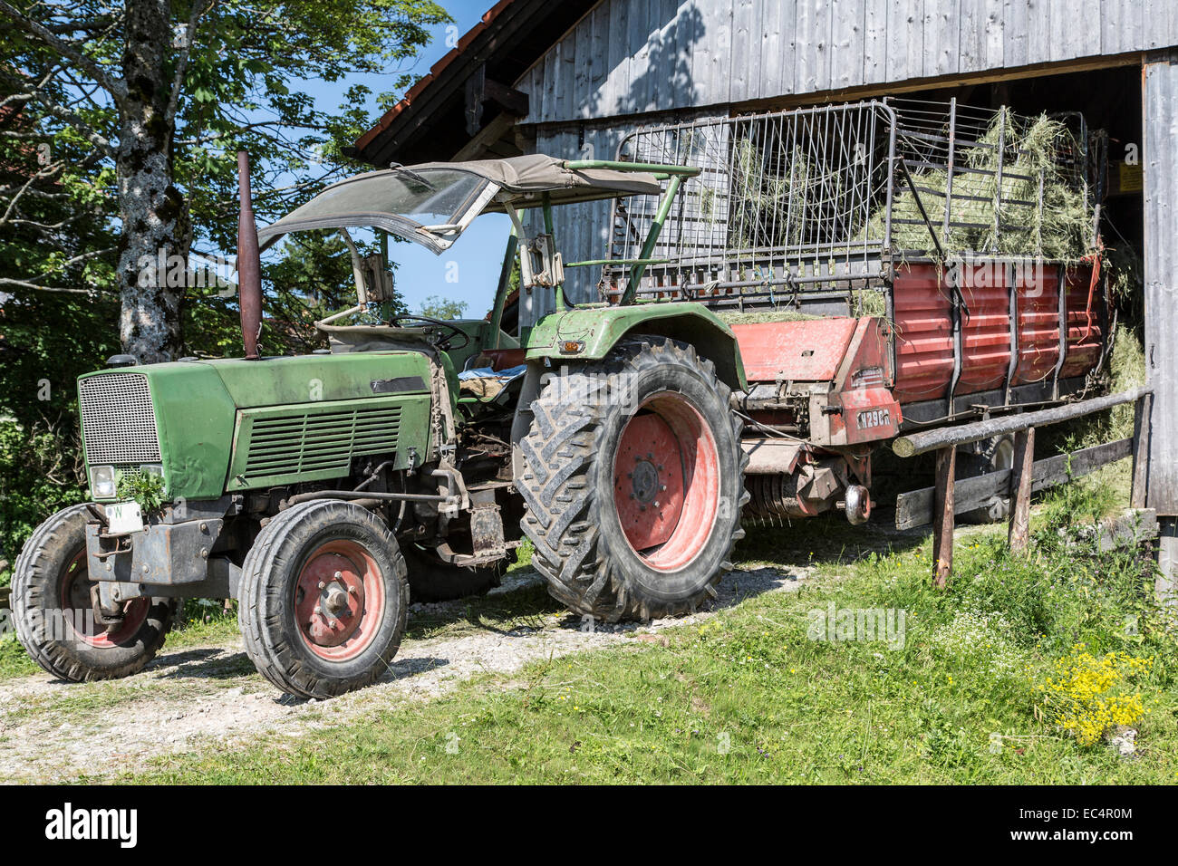 Tractor with Hay Loader Stock Photo - Alamy