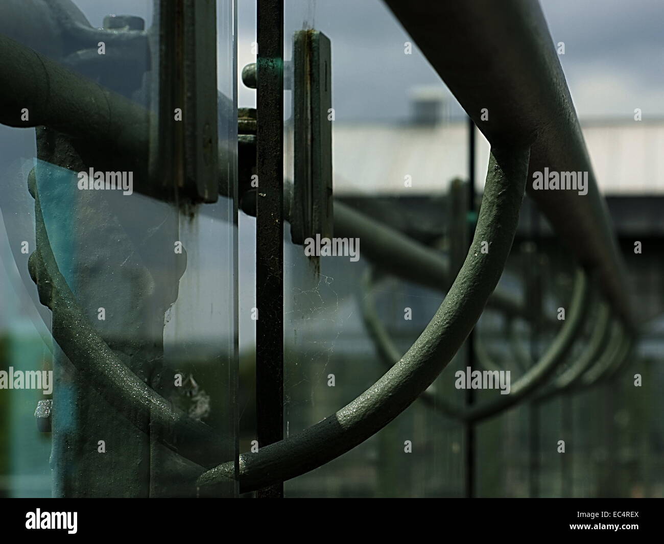 handrail with reflection in the glass Stock Photo - Alamy
