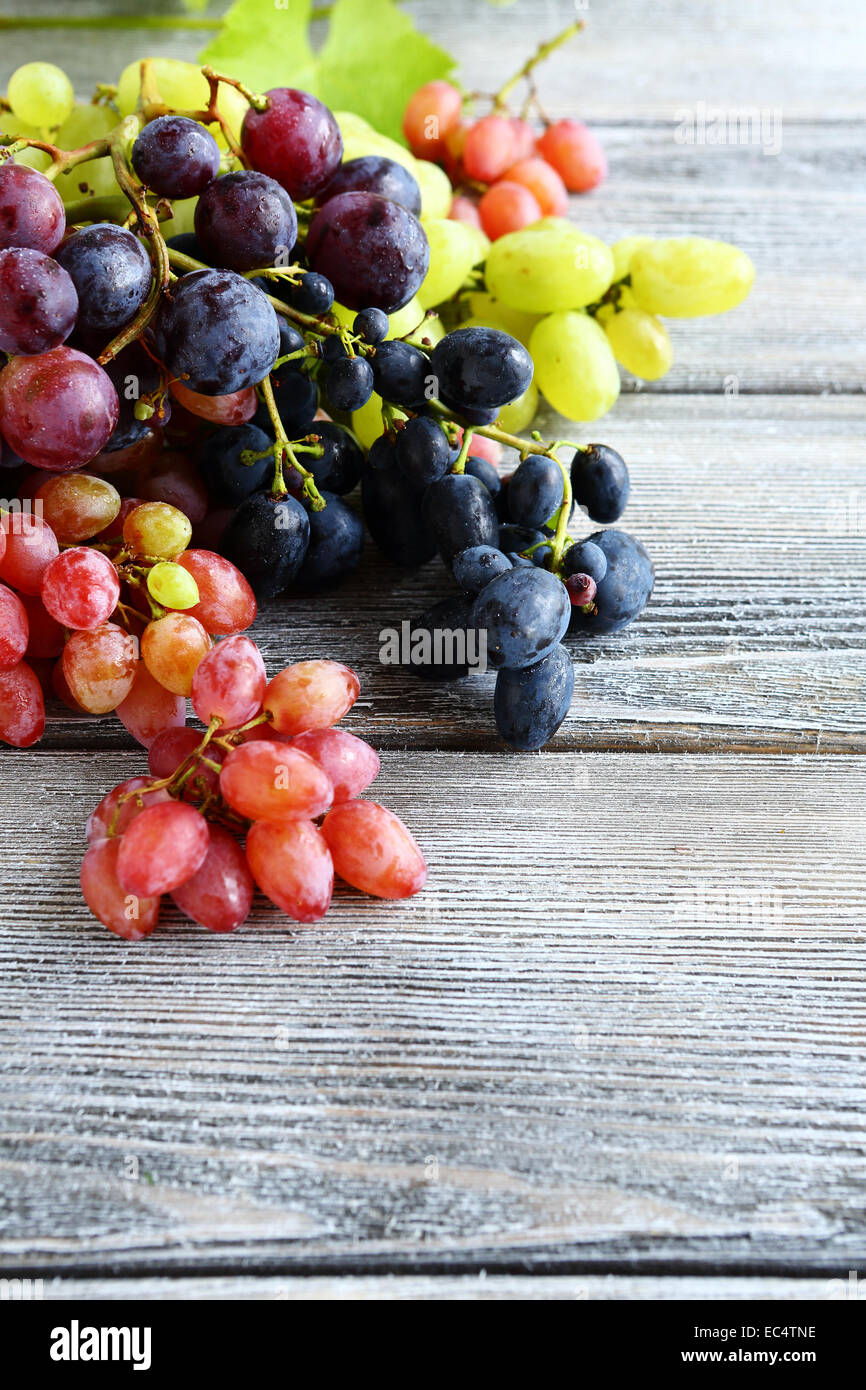 Mix of Fresh grapes on the boards, tasty food Stock Photo - Alamy