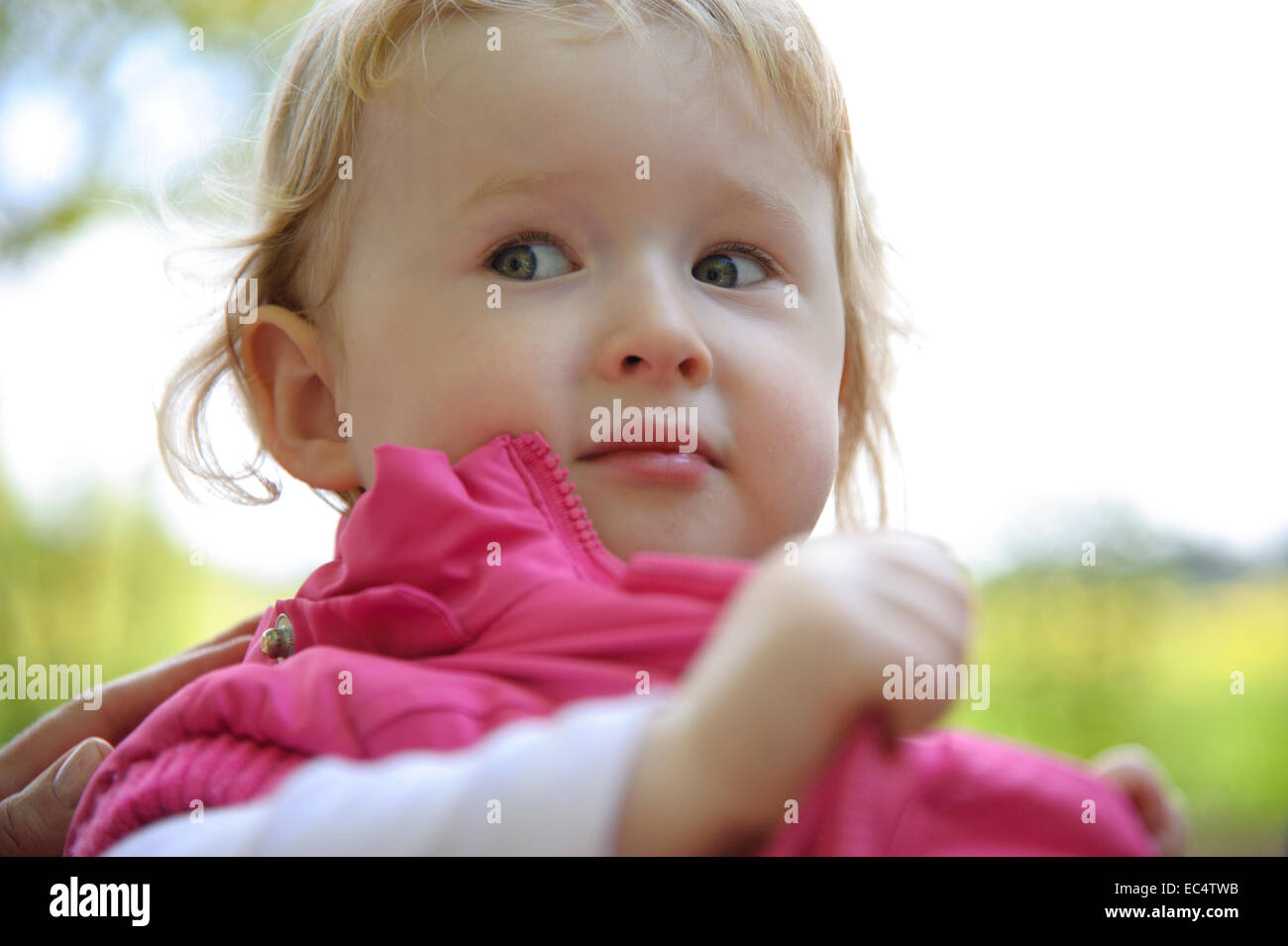 little girl with a skeptical view Stock Photo - Alamy