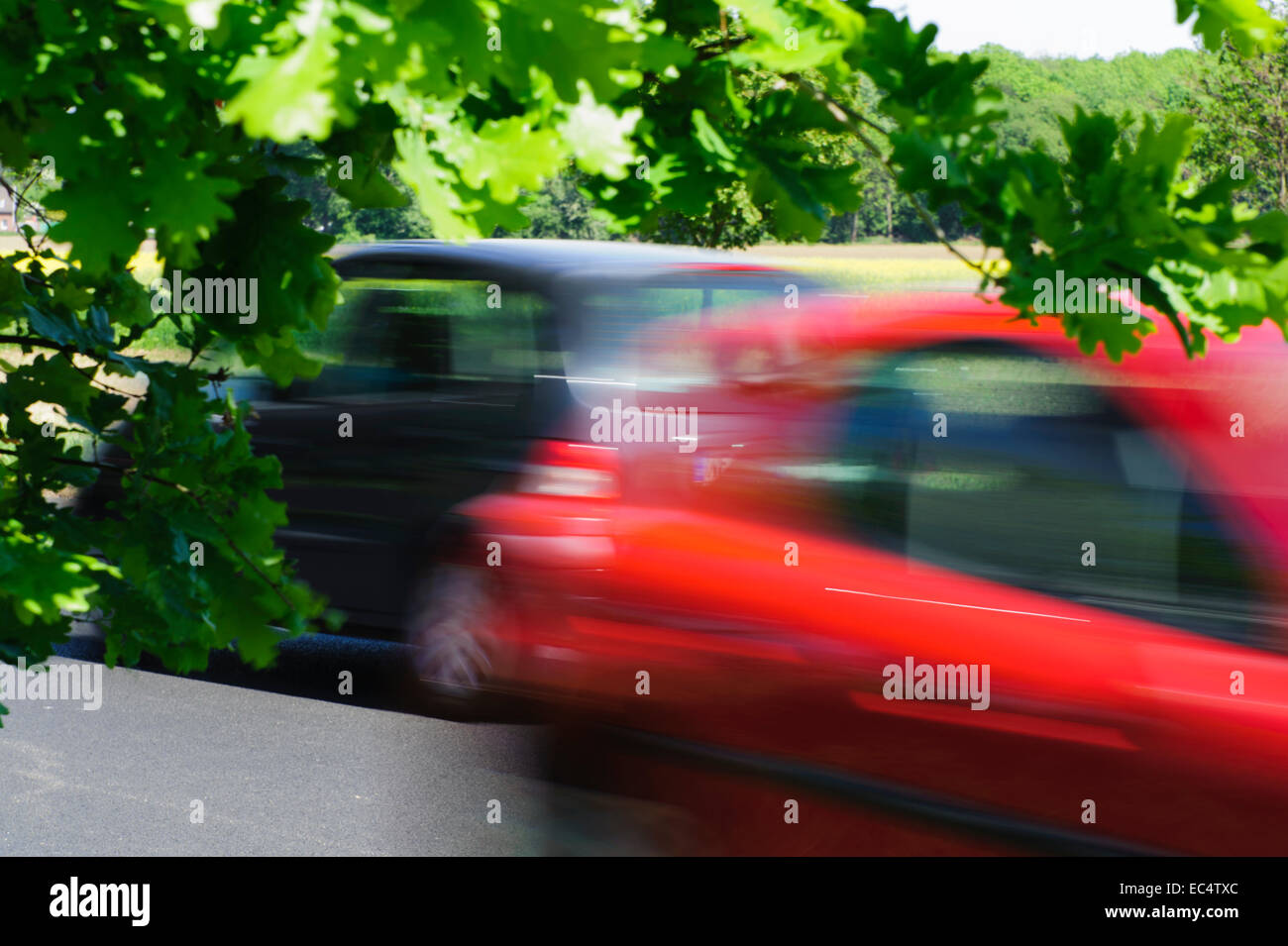 Encounter between two cars on a highway Stock Photo - Alamy