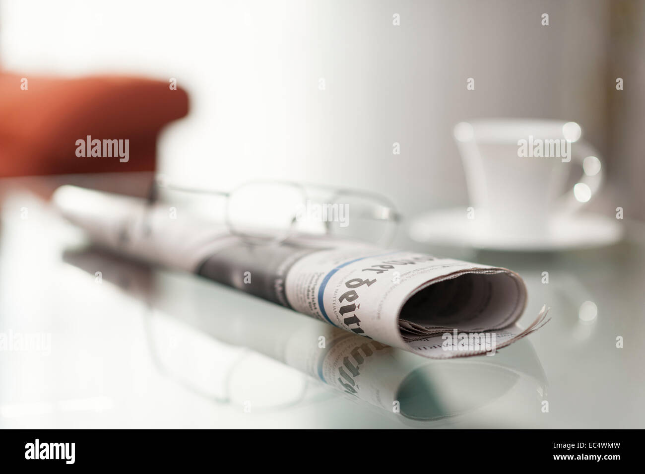 Rolled newspaper hi-res stock photography and images - Alamy