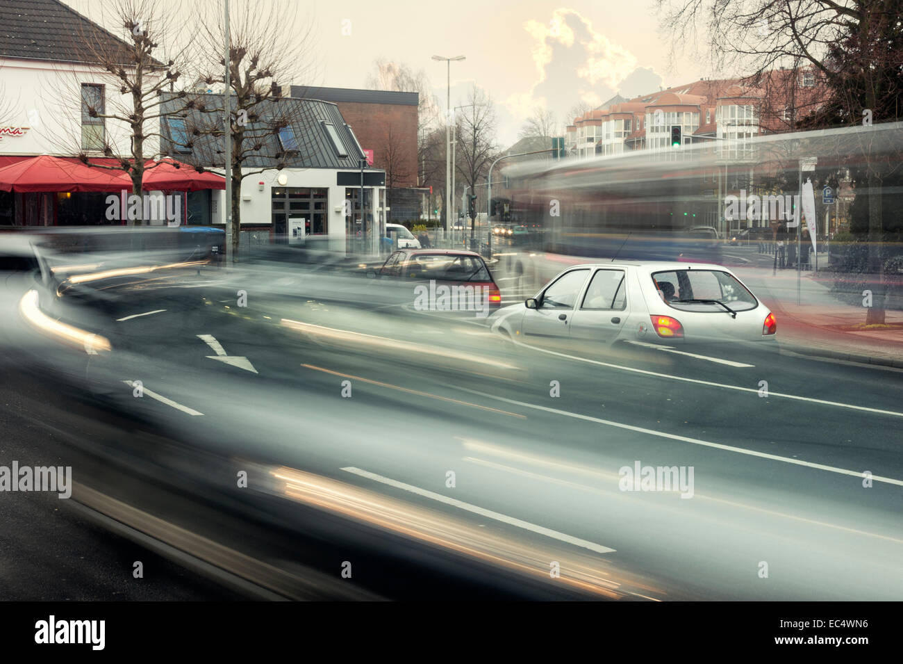 flowing traffic in the city a small town Stock Photo - Alamy