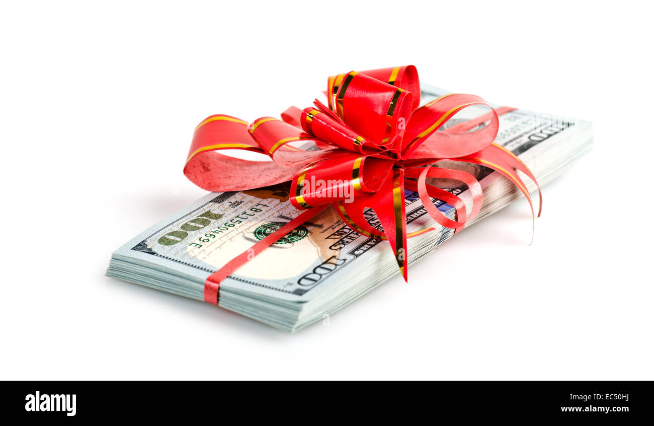 Money gift, big stack of dollars with red bow isolated on white ...