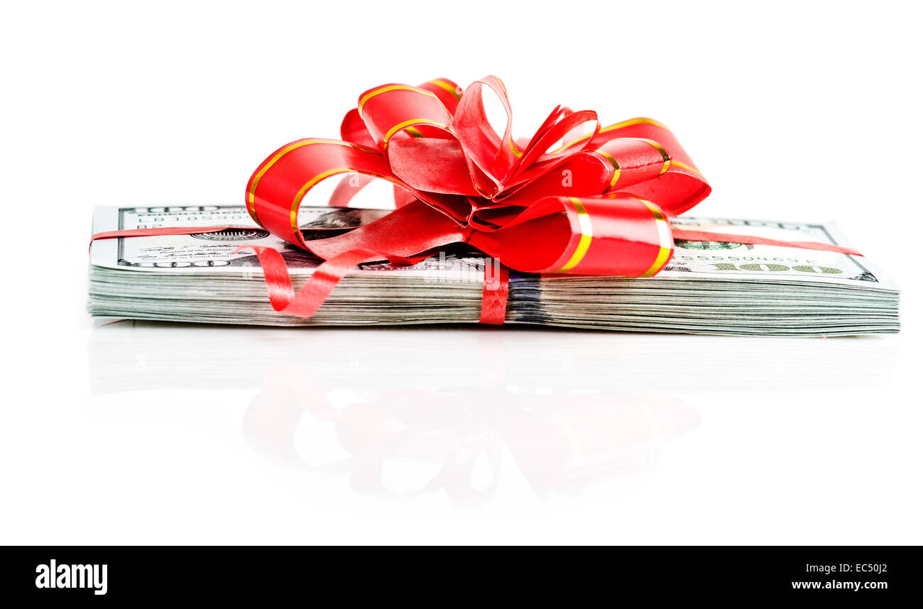 Money gift, big stack of dollars with red bow isolated on white ...