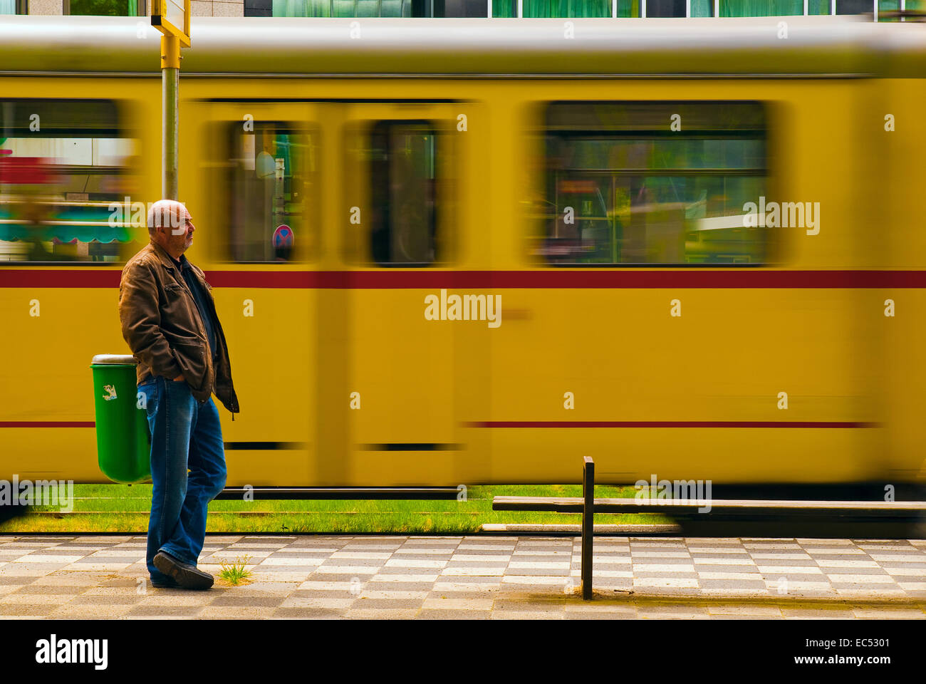 Man waiting for train Stock Photo - Alamy