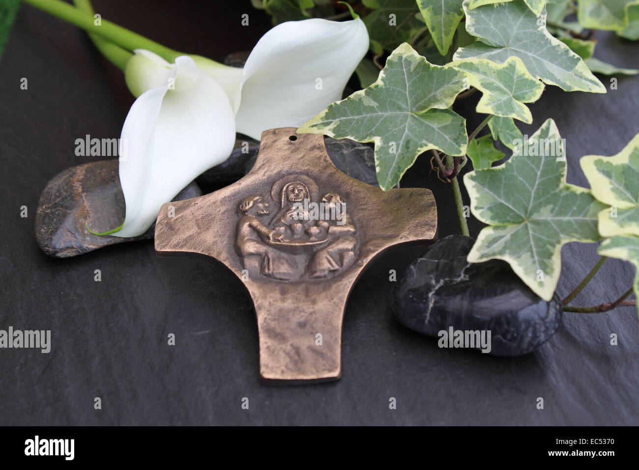 Cross with figure of the Holy Communion Stock Photo - Alamy