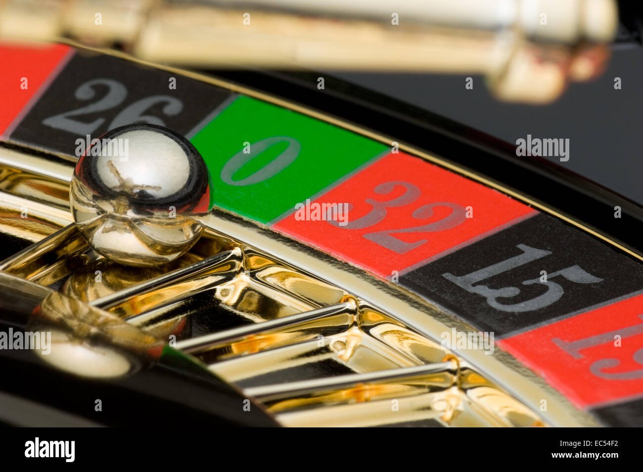 Roulette ball on Zero Stock Photo - Alamy