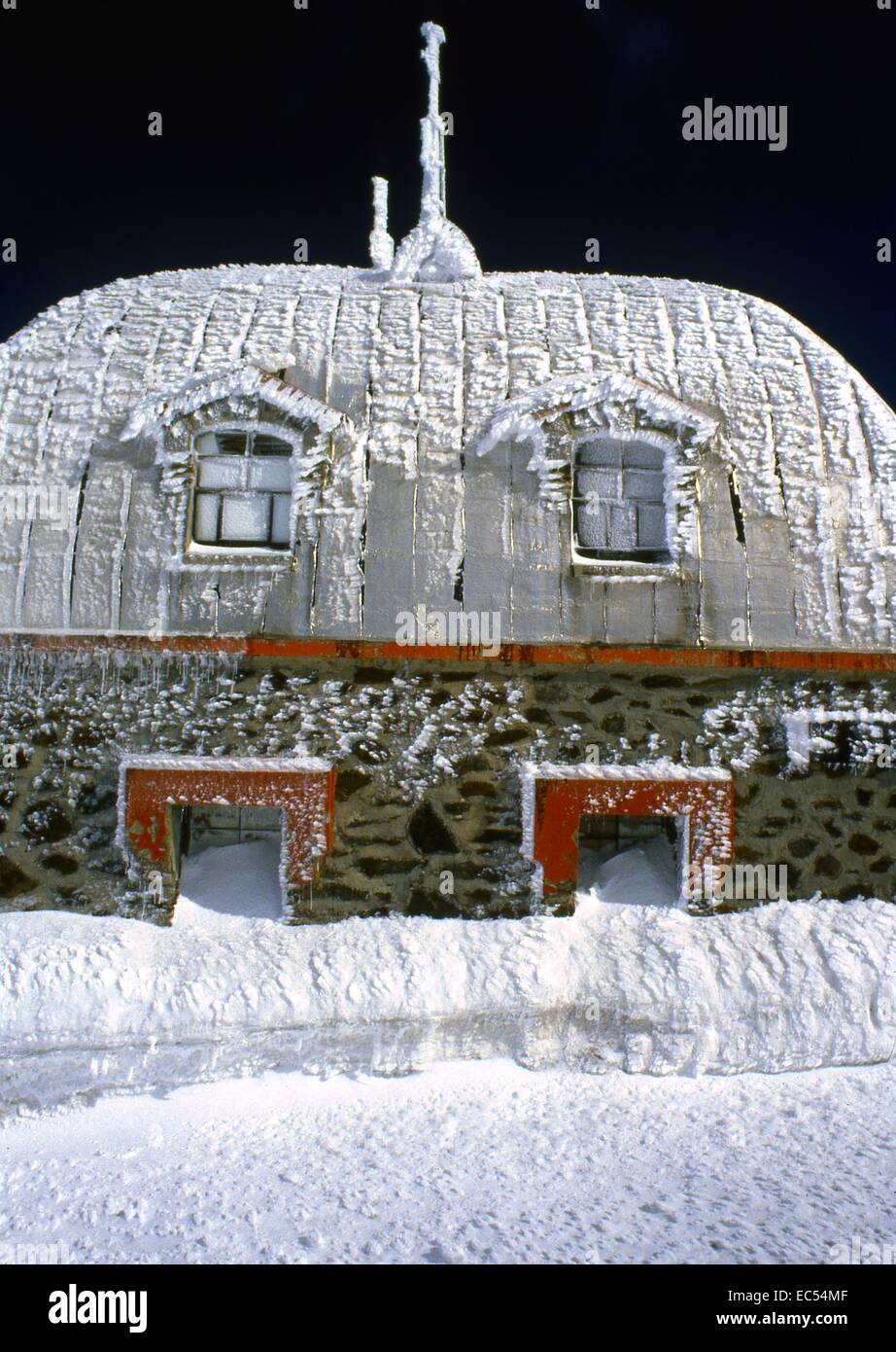 hotel in snow and ice Stock Photo - Alamy