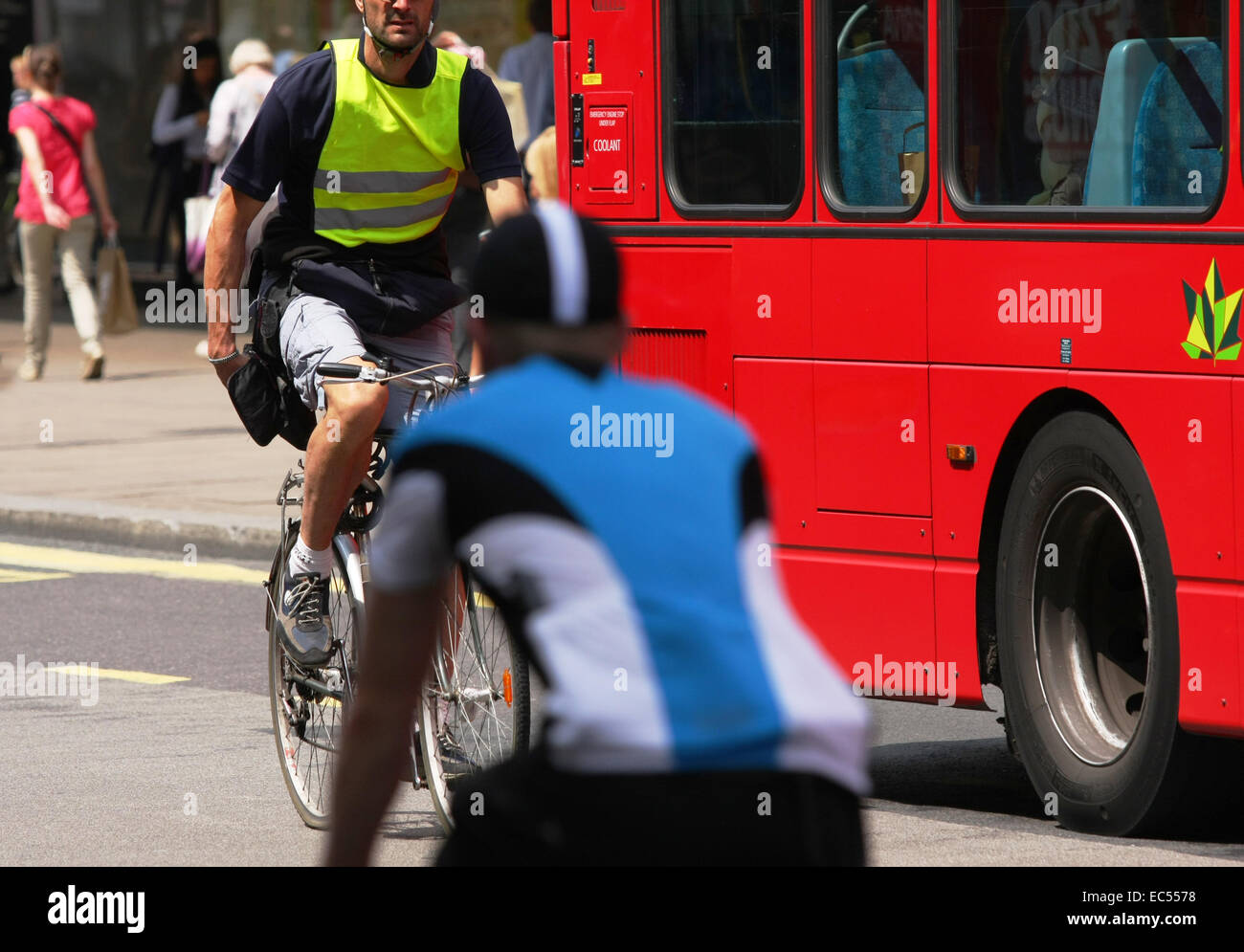 Cyclists and a bus in Oxford Street, London Stock Photo - Alamy
