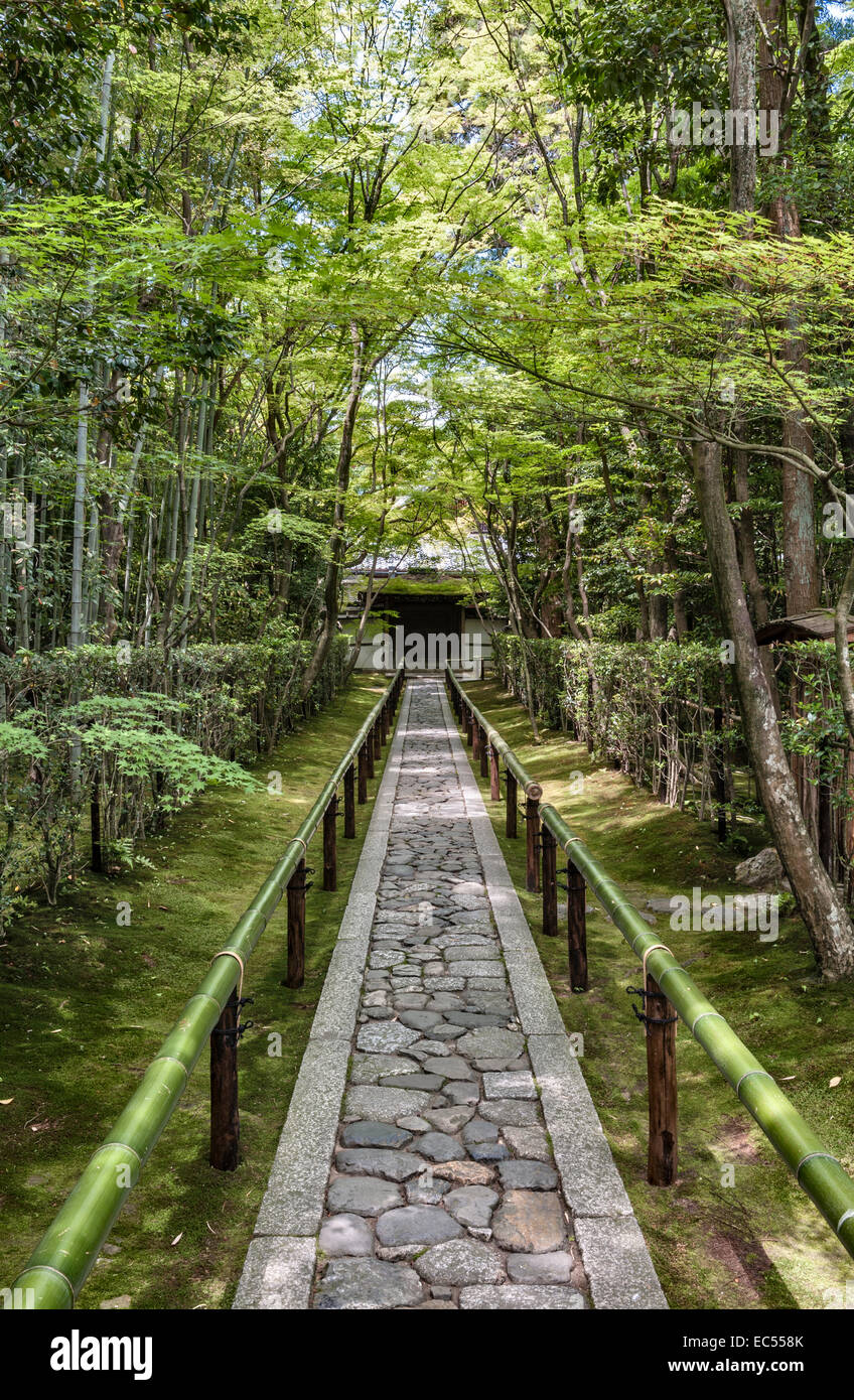 Koto-in zen temple, Daitoku-ji, Kyoto, Japan, in spring. The paved entrance path leads through a ...