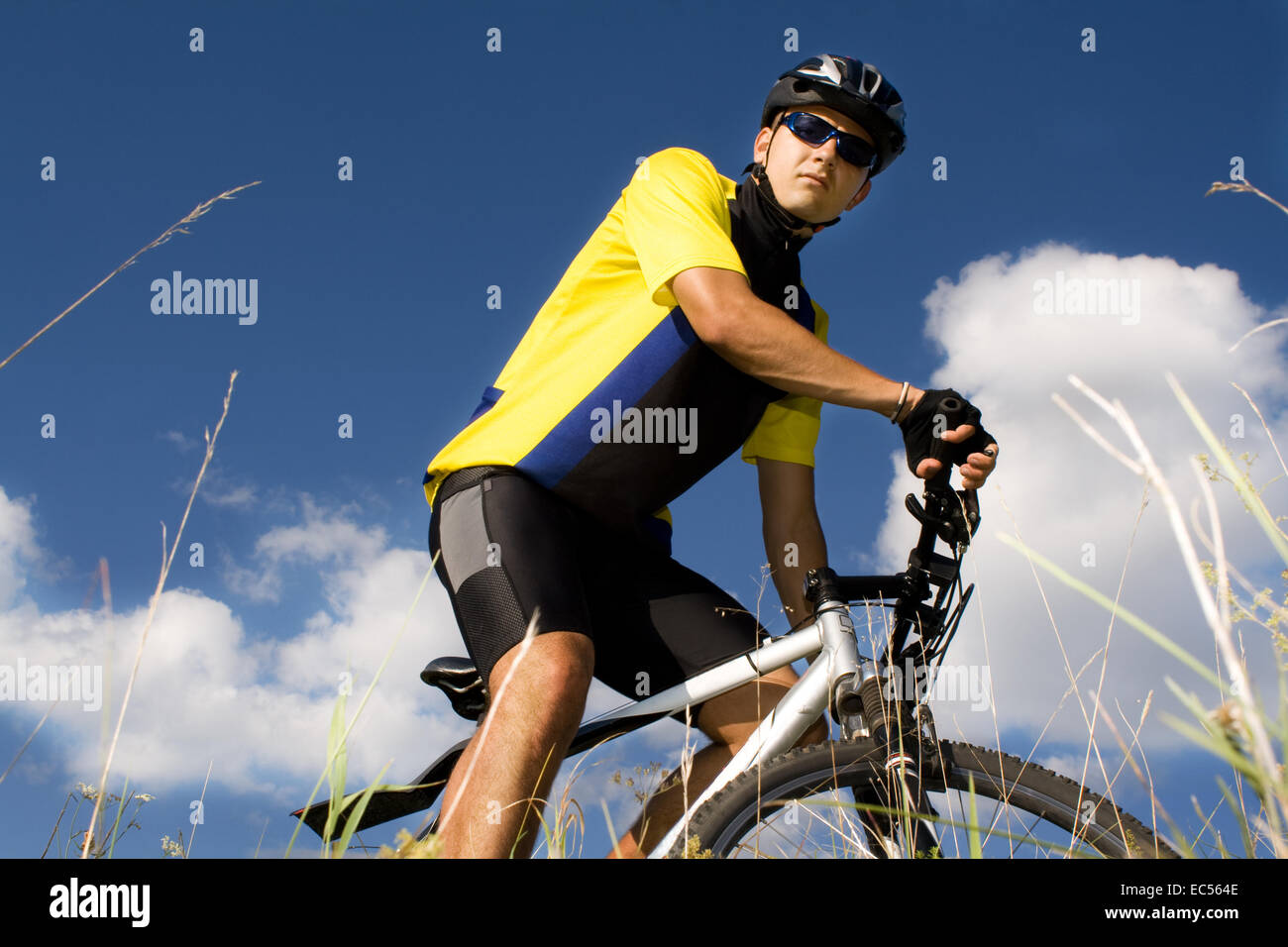 a biking man in front of nature scenes Stock Photo - Alamy