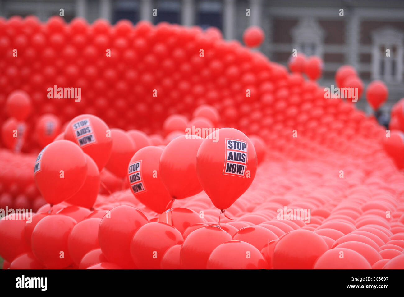 Red ribbon of the Dutch organization STOP AIDS NOW during an awareness ...