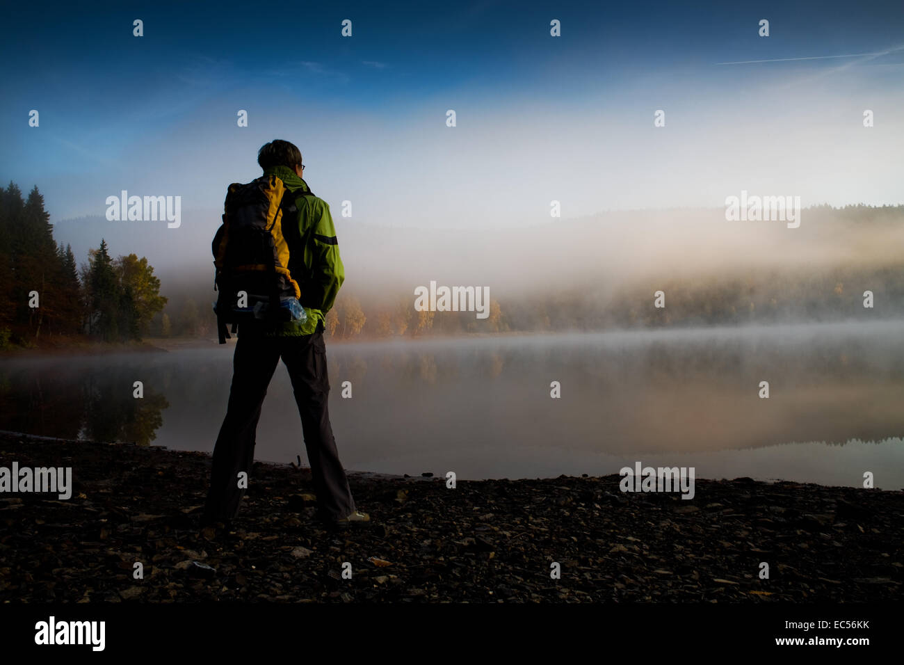 Scenes of hiking in the wild Early in the morning at a lake Stock Photo ...