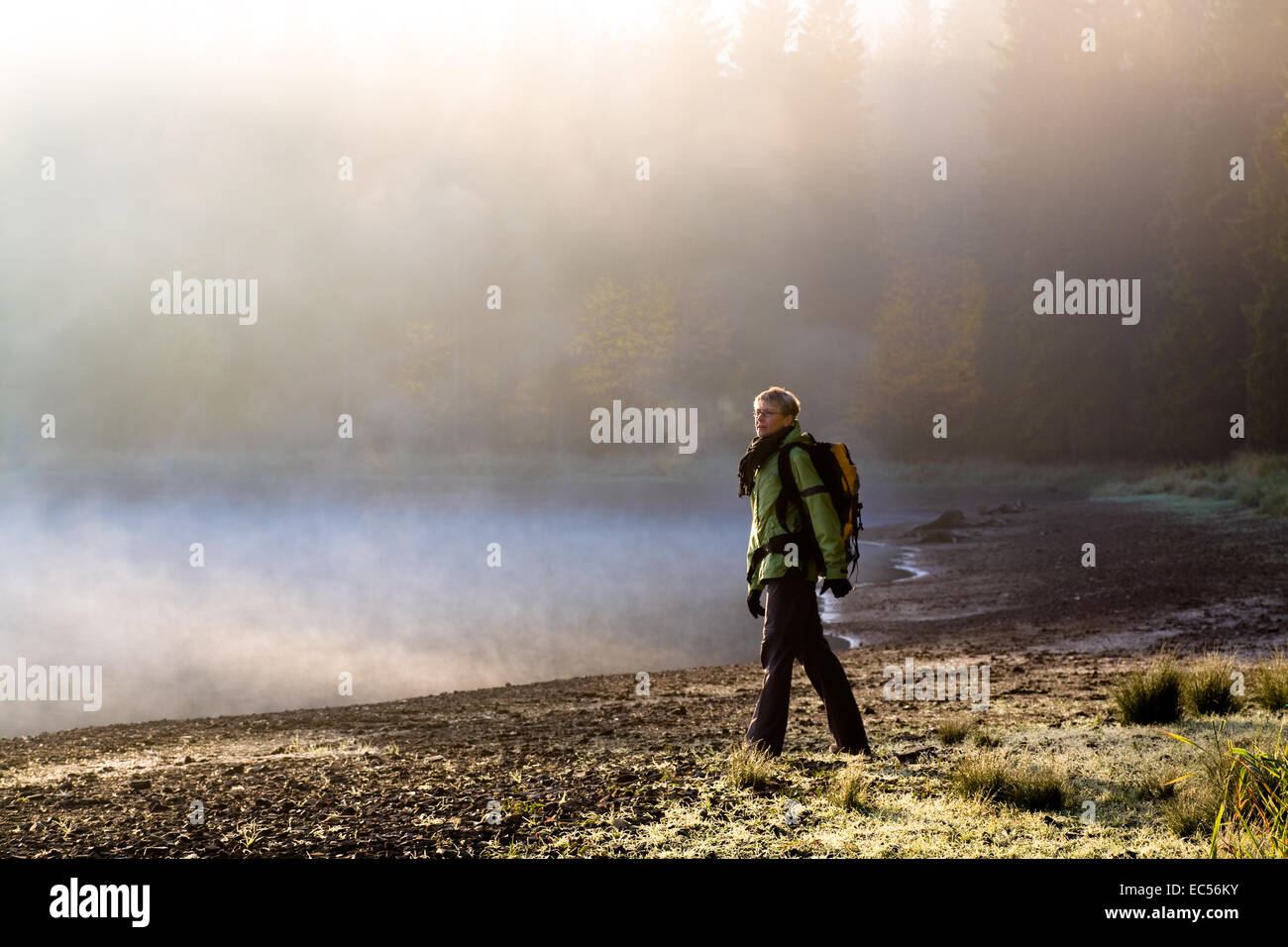 Scenes of hiking in the wild Early in the morning at a lake Stock Photo ...