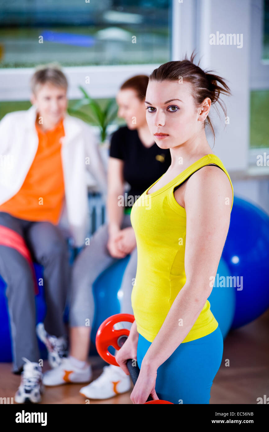 Young women exercising in a step aerobics class Stock Photo - Alamy