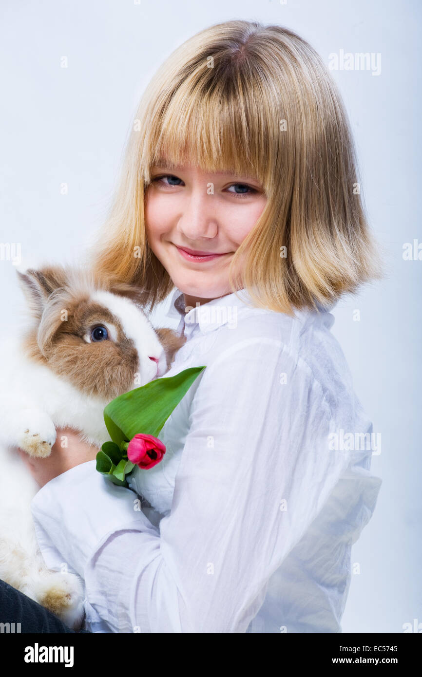 Girl and rabbit hi-res stock photography and images - Alamy