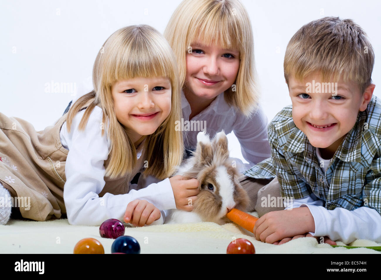 kids and a eastern rabbit Stock Photo - Alamy