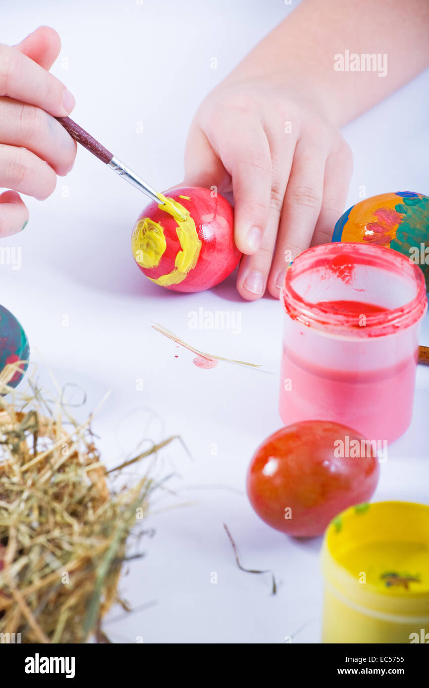 the girl painting easter eggs Stock Photo - Alamy