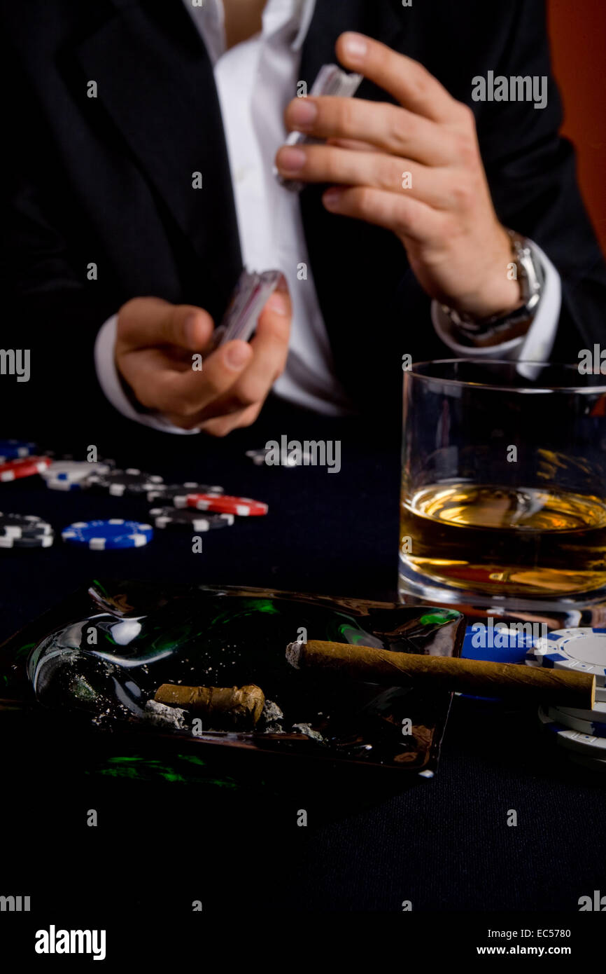 a young man playing poker Stock Photo - Alamy
