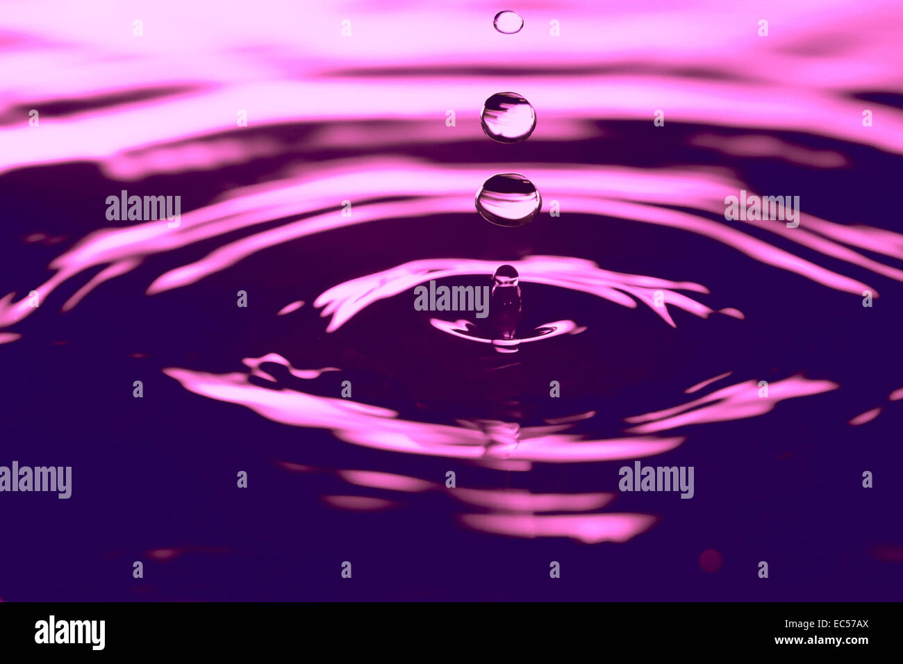 the falling water drop closeup shot Stock Photo - Alamy