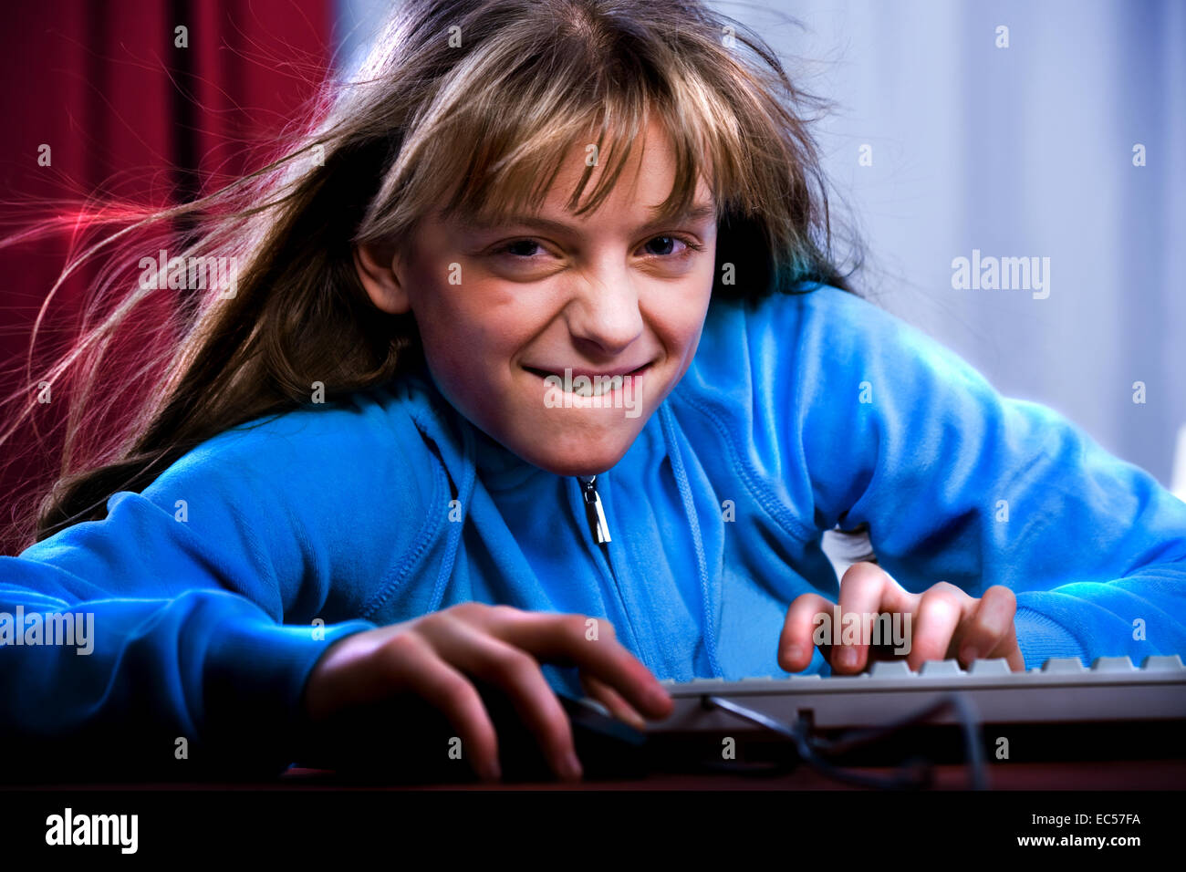 girl playing computer game Stock Photo - Alamy