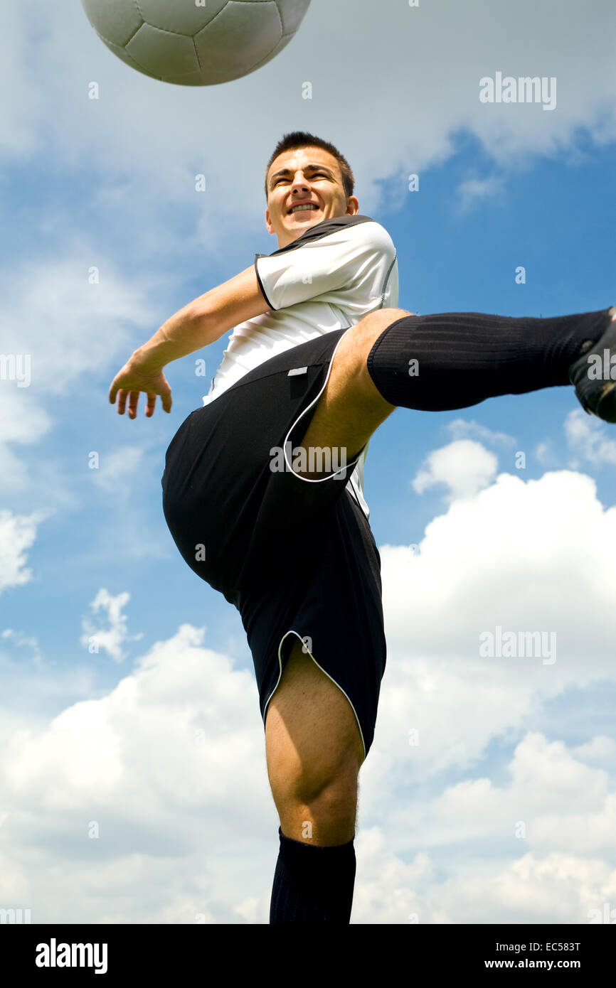 a football player on the field Stock Photo - Alamy