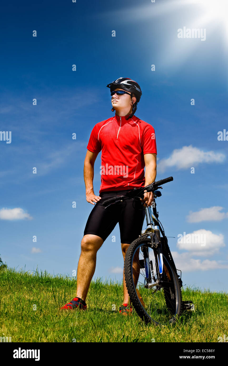 a biking man in front of nature scenes Stock Photo - Alamy