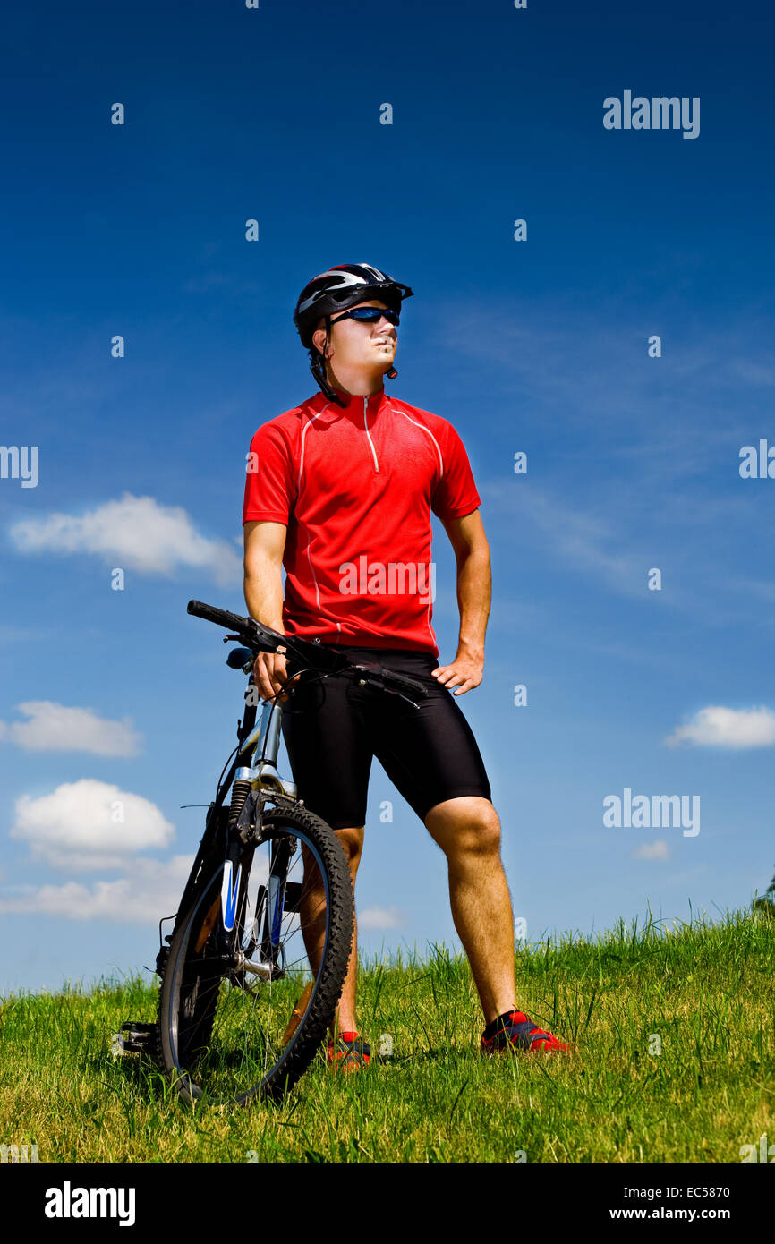 a biking man in front of nature scenes Stock Photo - Alamy