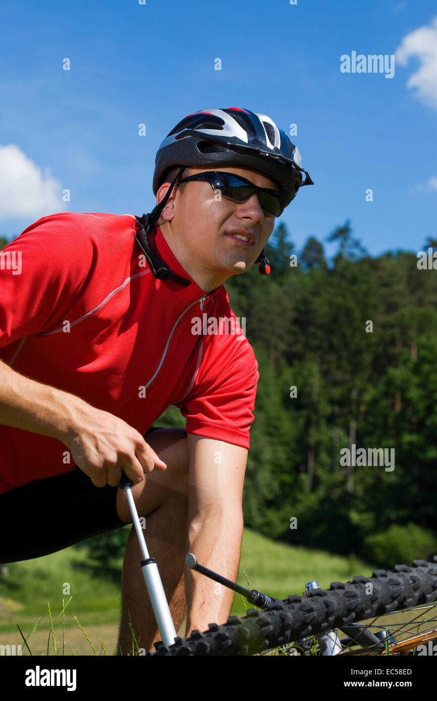 a biking man in front of nature scenes Stock Photo - Alamy