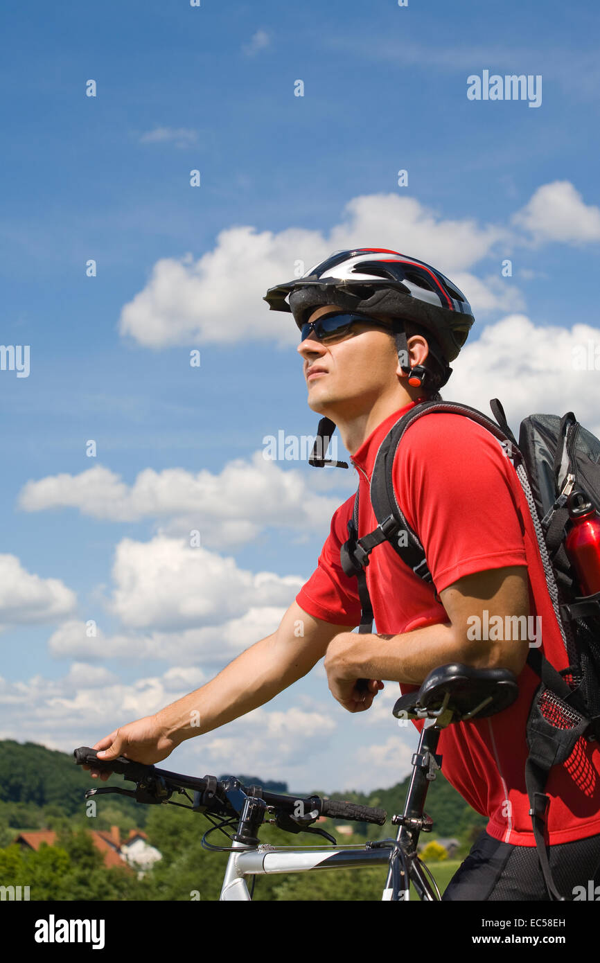 a biking man in front of nature scenes Stock Photo - Alamy