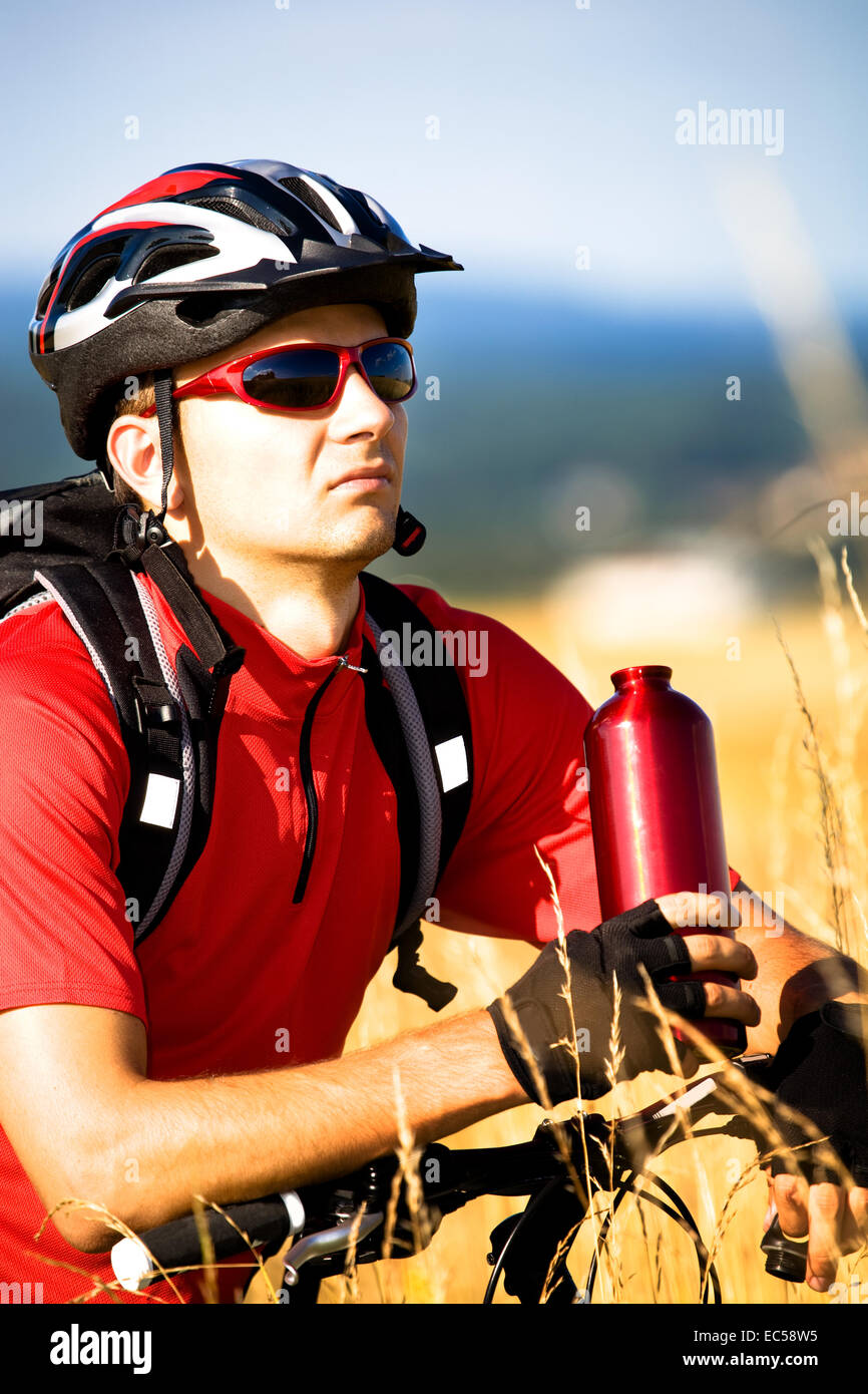 a biking man in front of nature scenes Stock Photo - Alamy