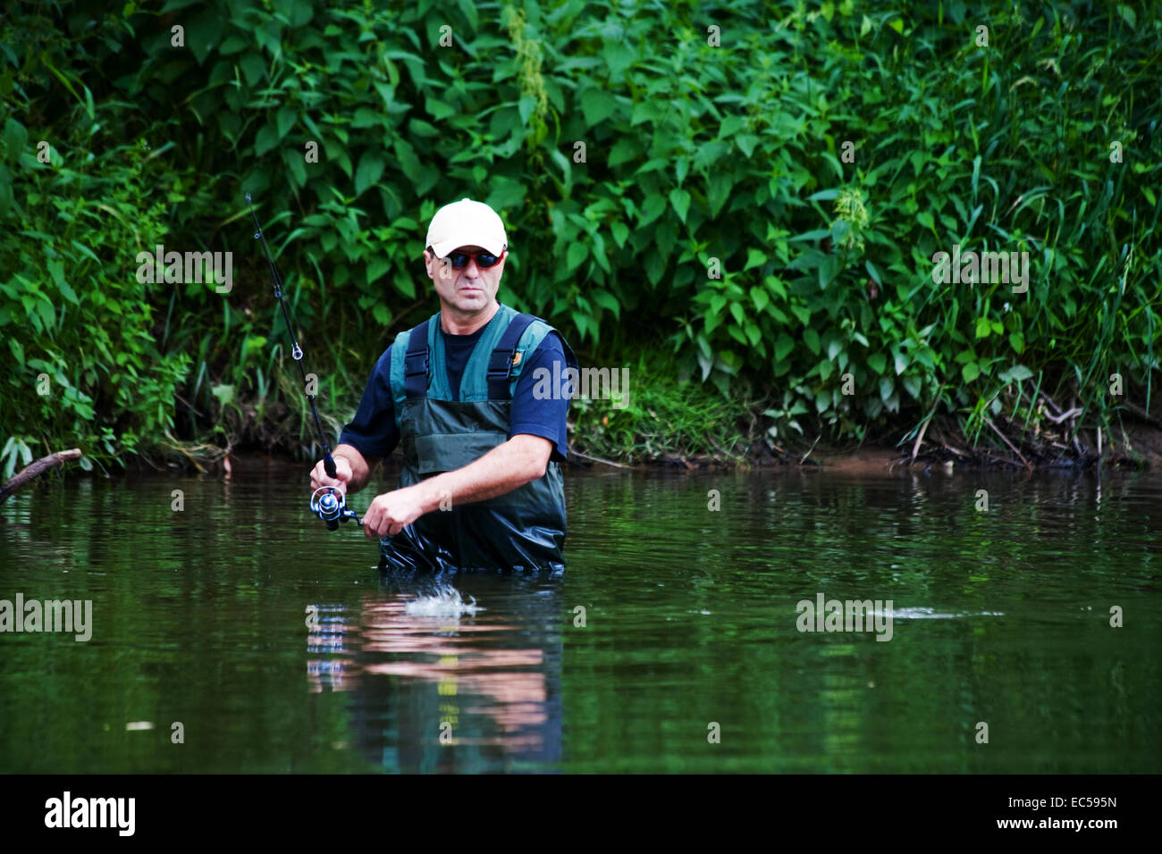 Angler fishing in hi-res stock photography and images - Alamy