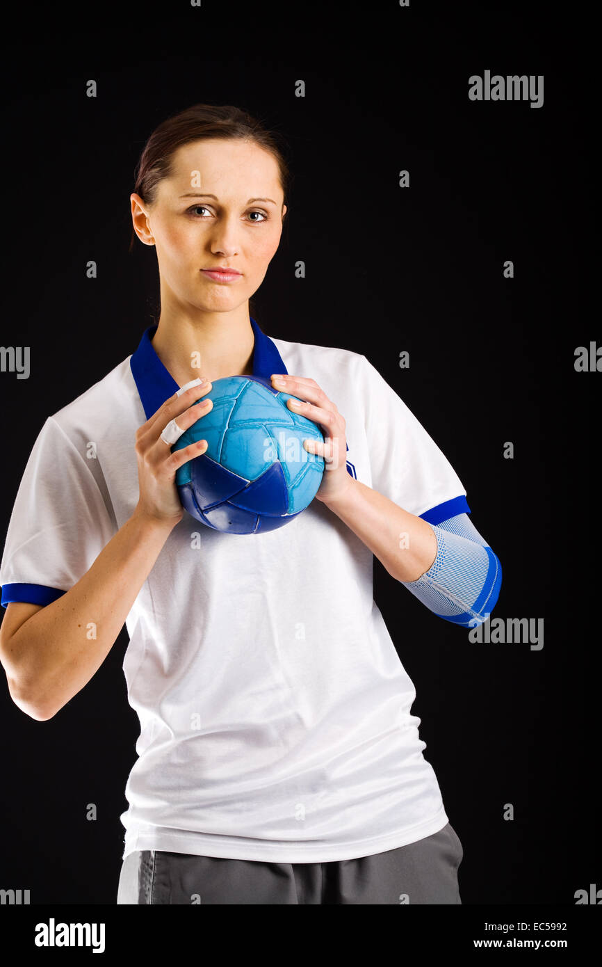 female handball player with a ball Stock Photo - Alamy