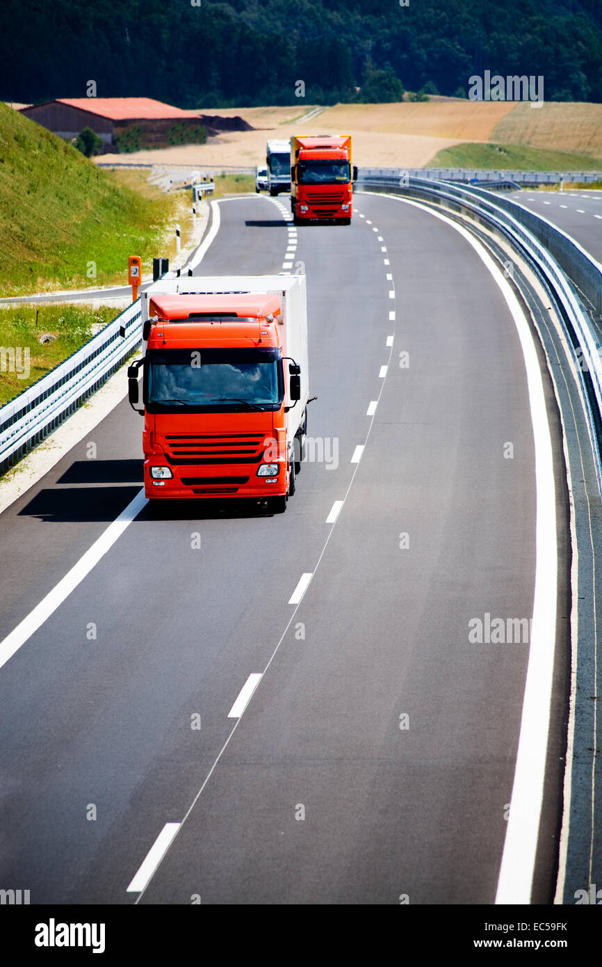 two trucks on the road Stock Photo - Alamy