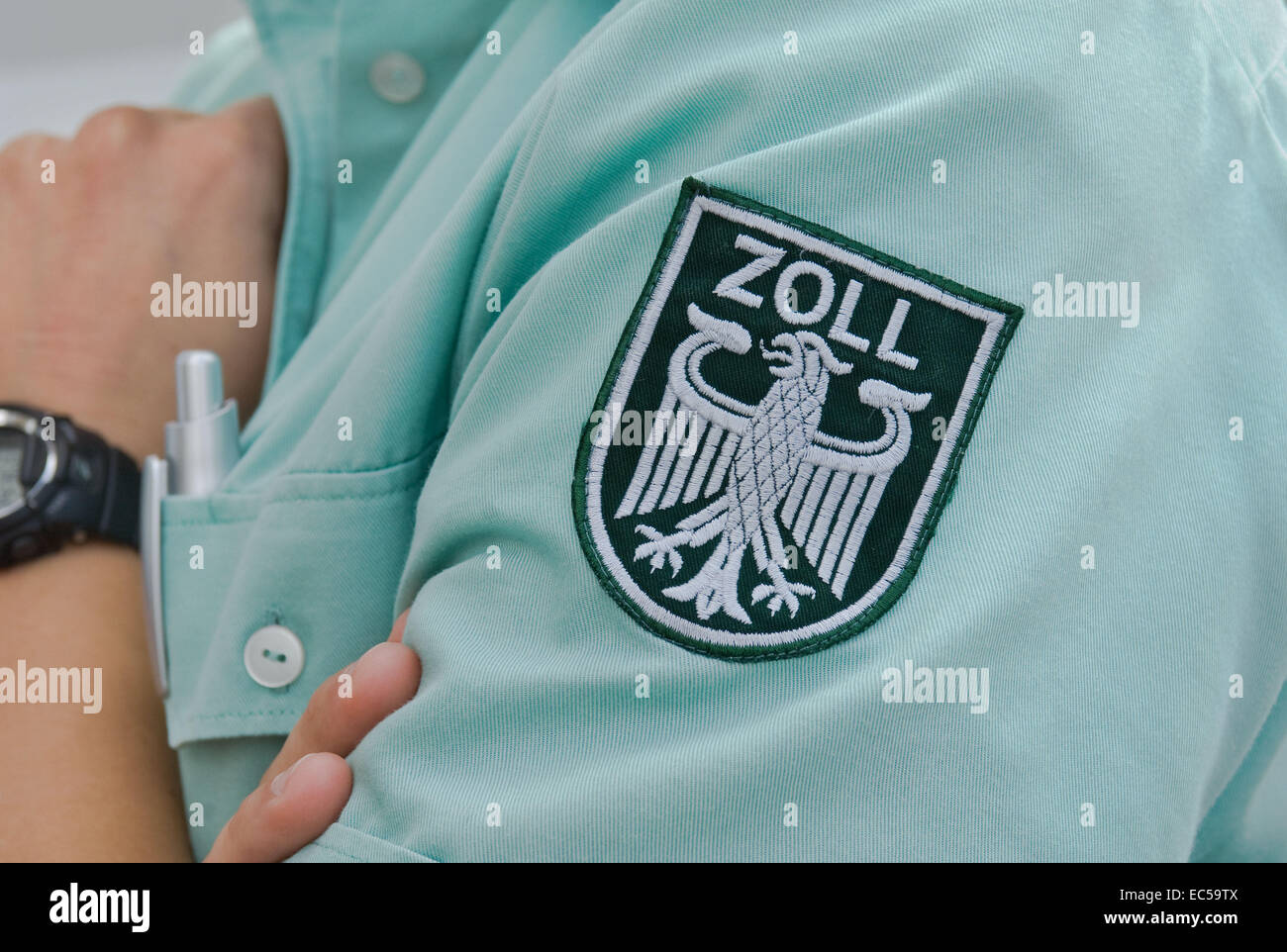 Label on the shirt of an german customs officer Stock Photo - Alamy