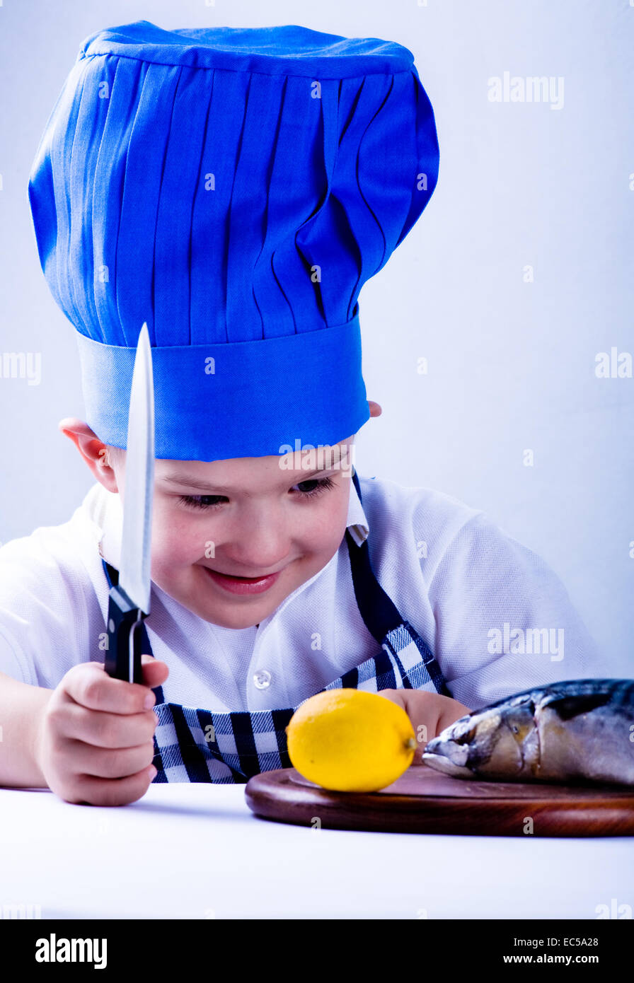 a 6 years old boy preparing a meal Stock Photo - Alamy