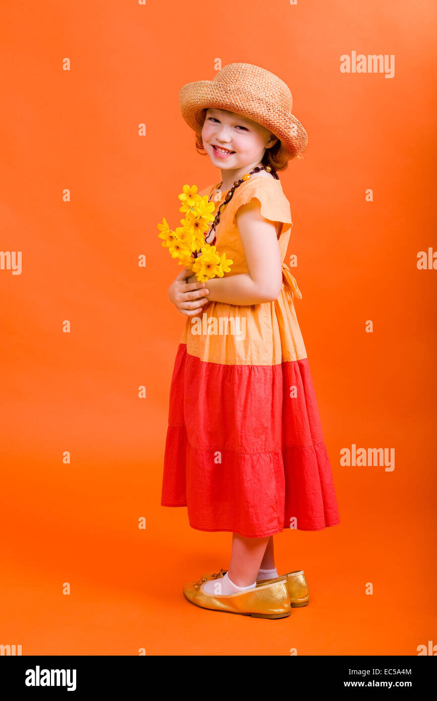 a little girl with a flower Stock Photo - Alamy