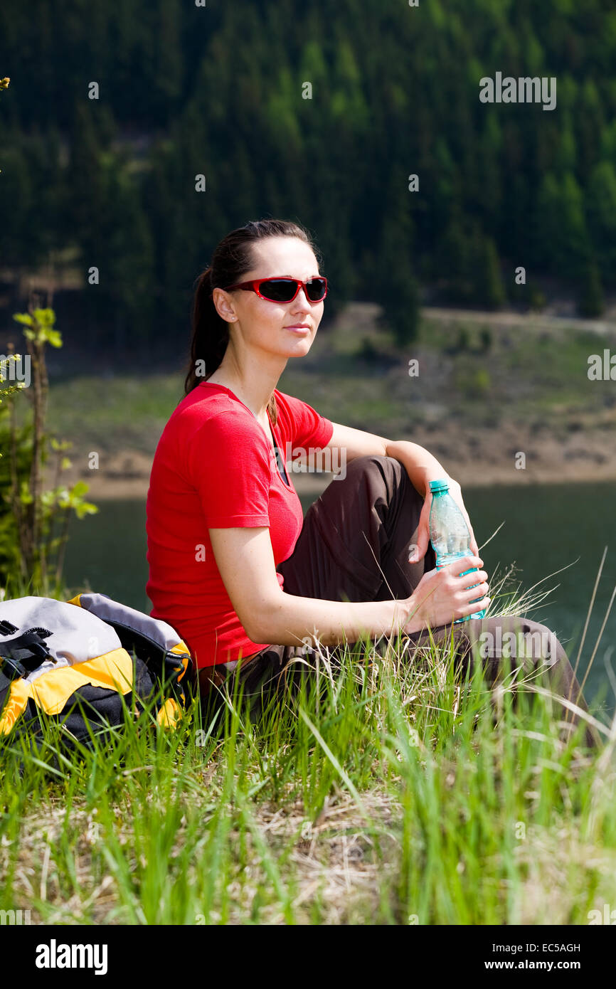 hiking woman in front of wilde nature Stock Photo - Alamy