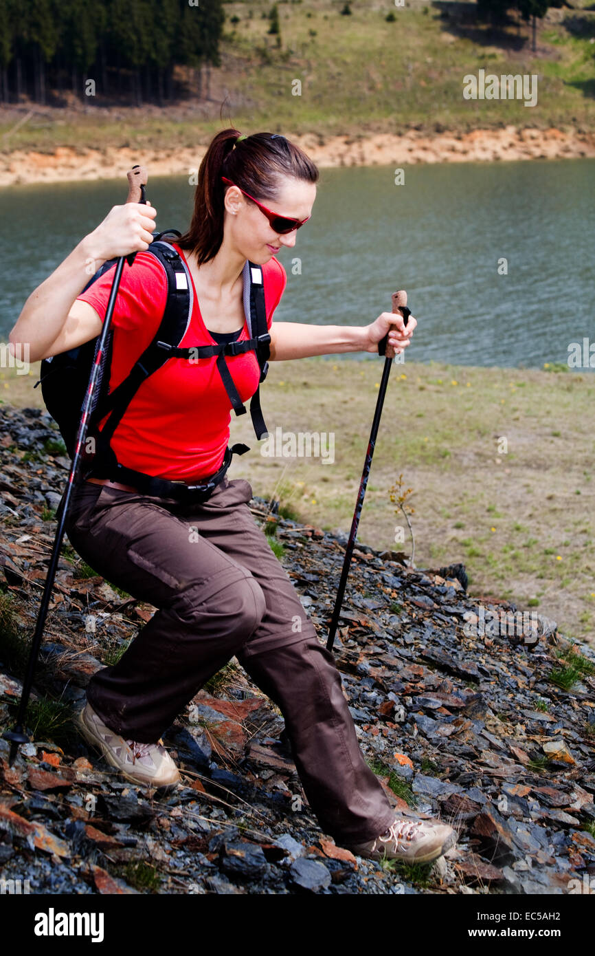 hiking woman in front of wilde nature Stock Photo - Alamy