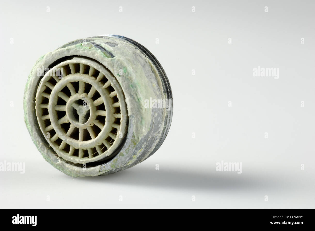 Calcified sieve of a faucet Stock Photo - Alamy