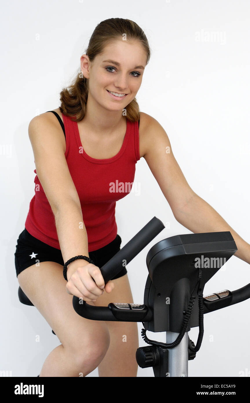 Exercise bike woman hi-res stock photography and images - Alamy