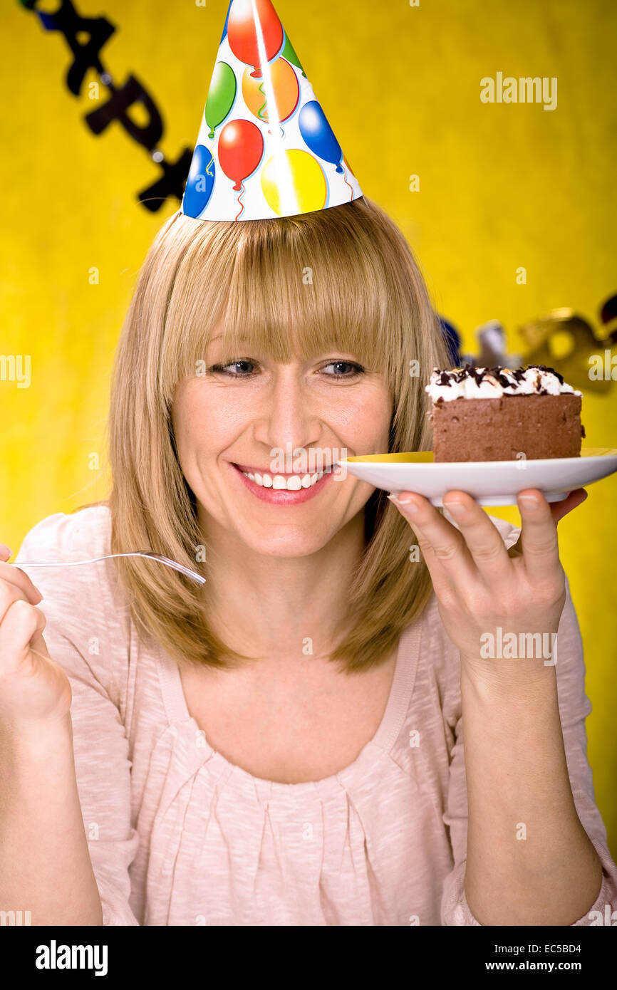 a woman celebrating birthday party Stock Photo - Alamy