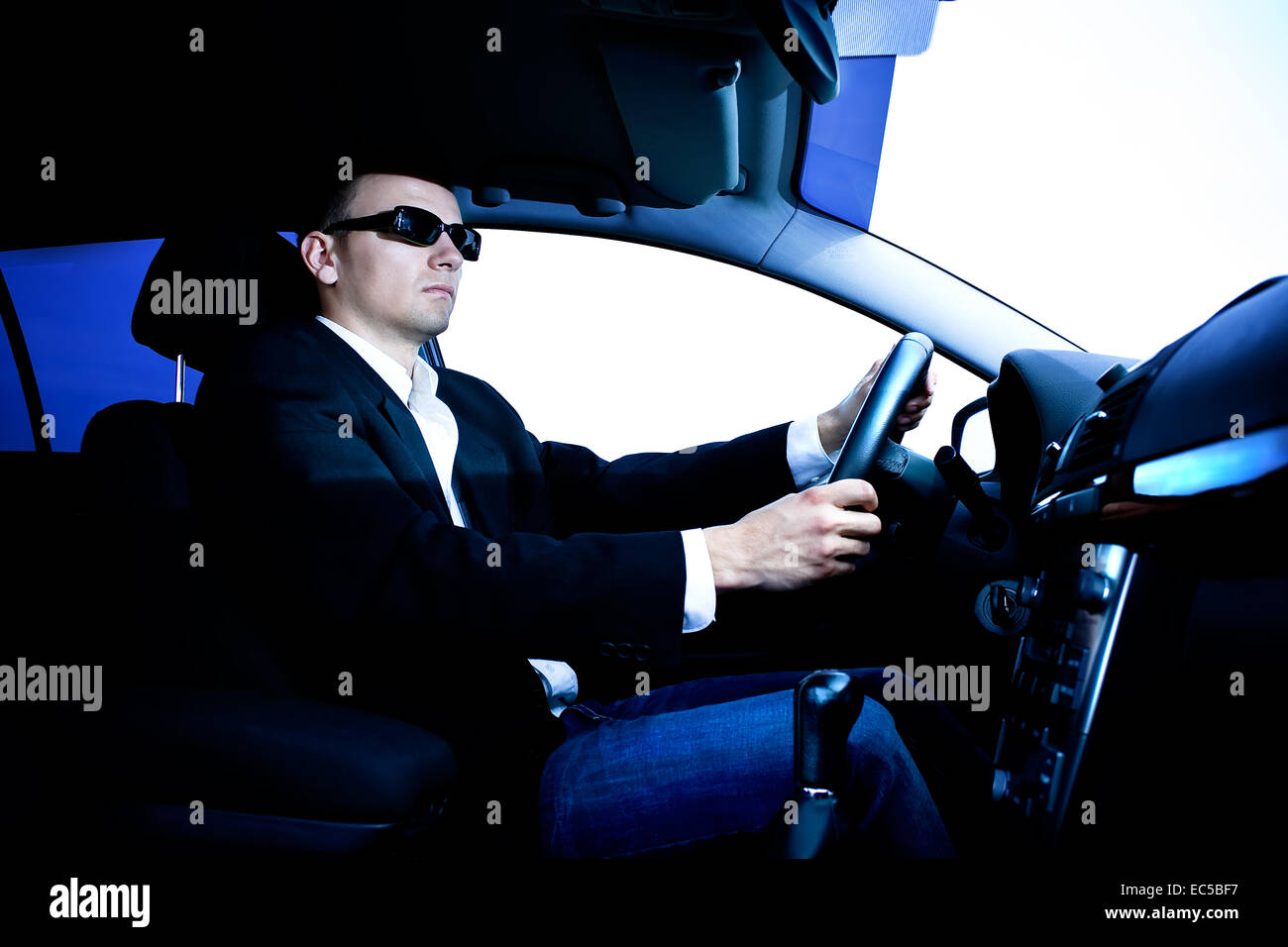 a young man driving the car Stock Photo - Alamy