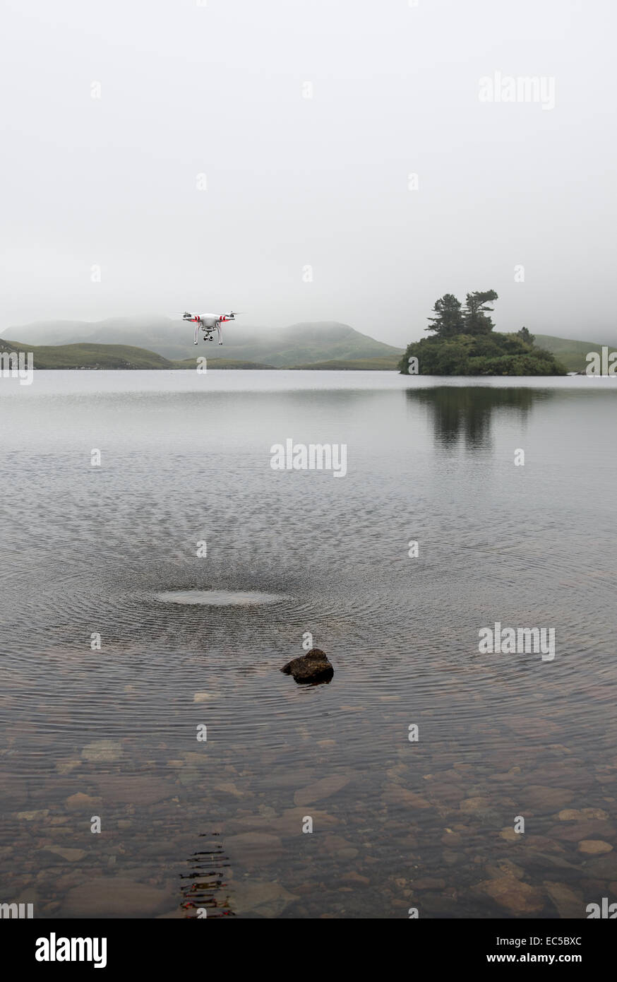 QuadCopter Drone hovering Stock Photo - Alamy