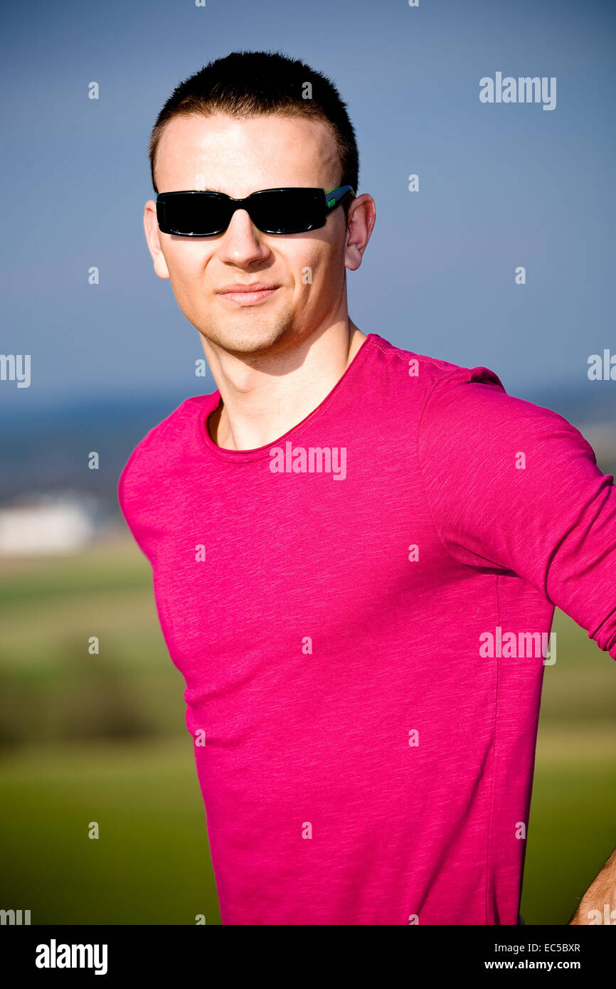 outdoor portrait of a young man Stock Photo - Alamy
