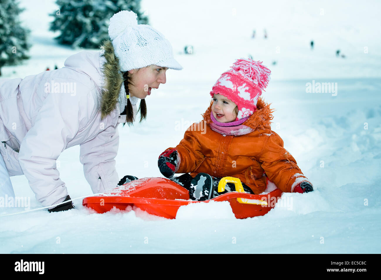 winter activities family in the winter forest Stock Photo - Alamy